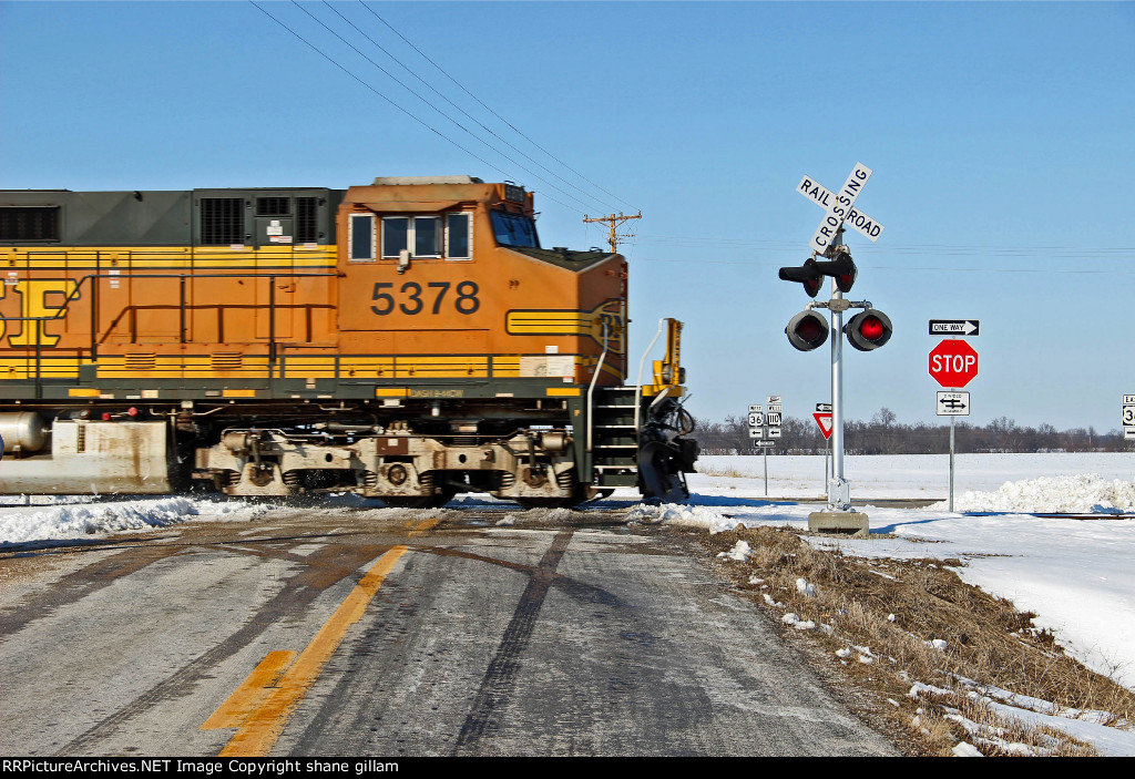 BNSF 5378 Heads across a crossing in rural Mo.